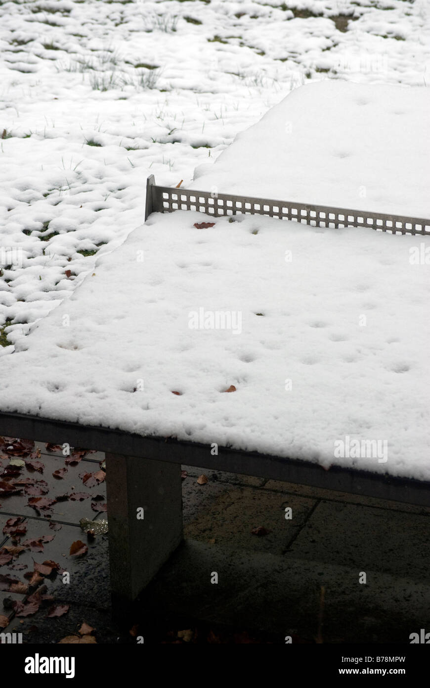 Snow covered table tennis table Stock Photo - Alamy