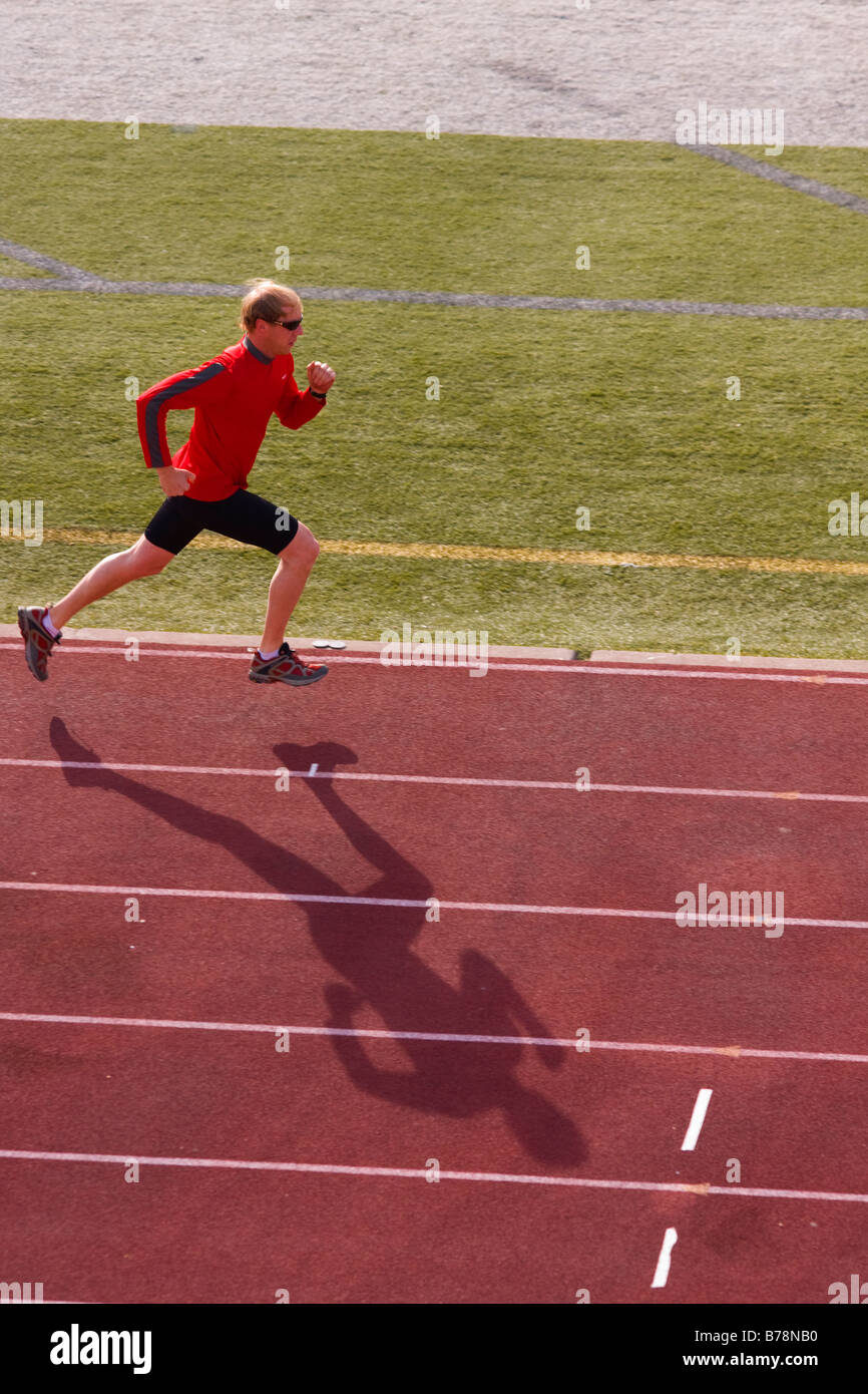 A man running on a track while training in Reno in Nevada Stock Photo ...