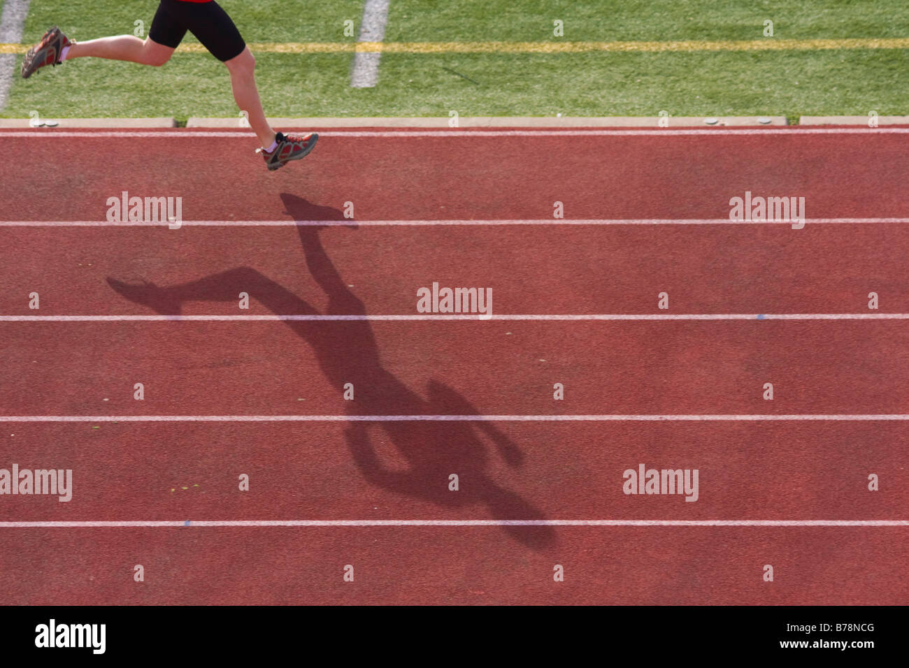 A man running on a track while training in Reno in Nevada Stock Photo ...