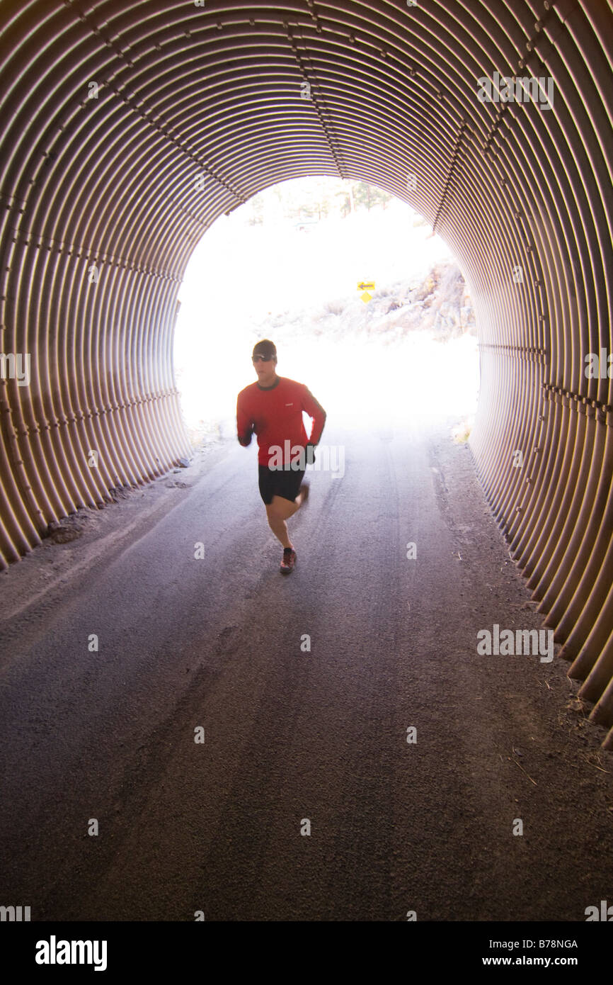 A man running through a tunnel in Reno in Nevada Stock Photo - Alamy