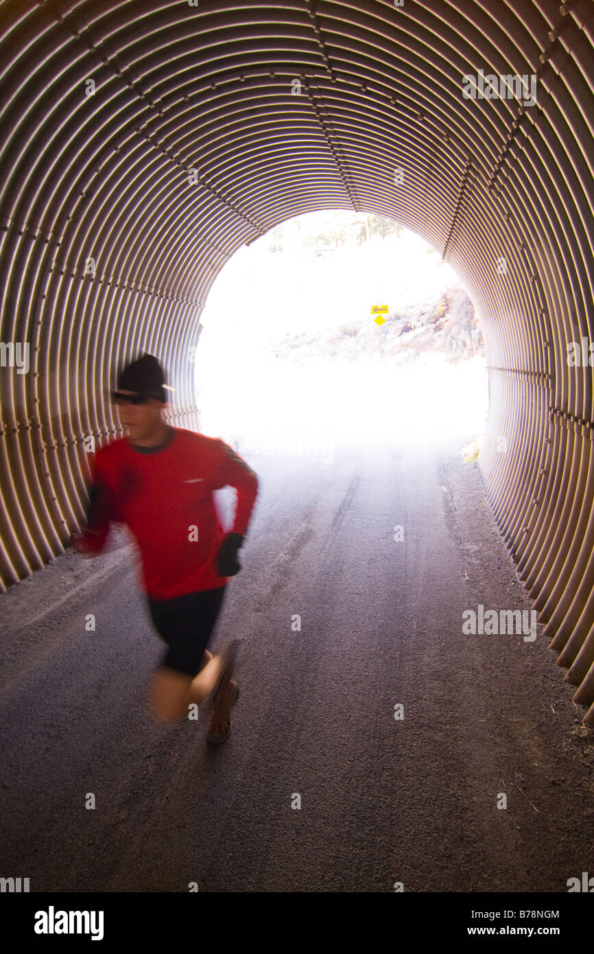 A man running through a tunnel in Reno in Nevada Stock Photo - Alamy