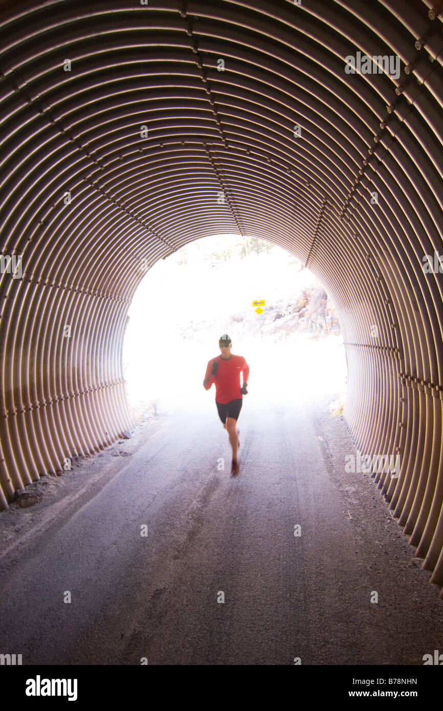 A man running through a tunnel in Reno in Nevada Stock Photo - Alamy