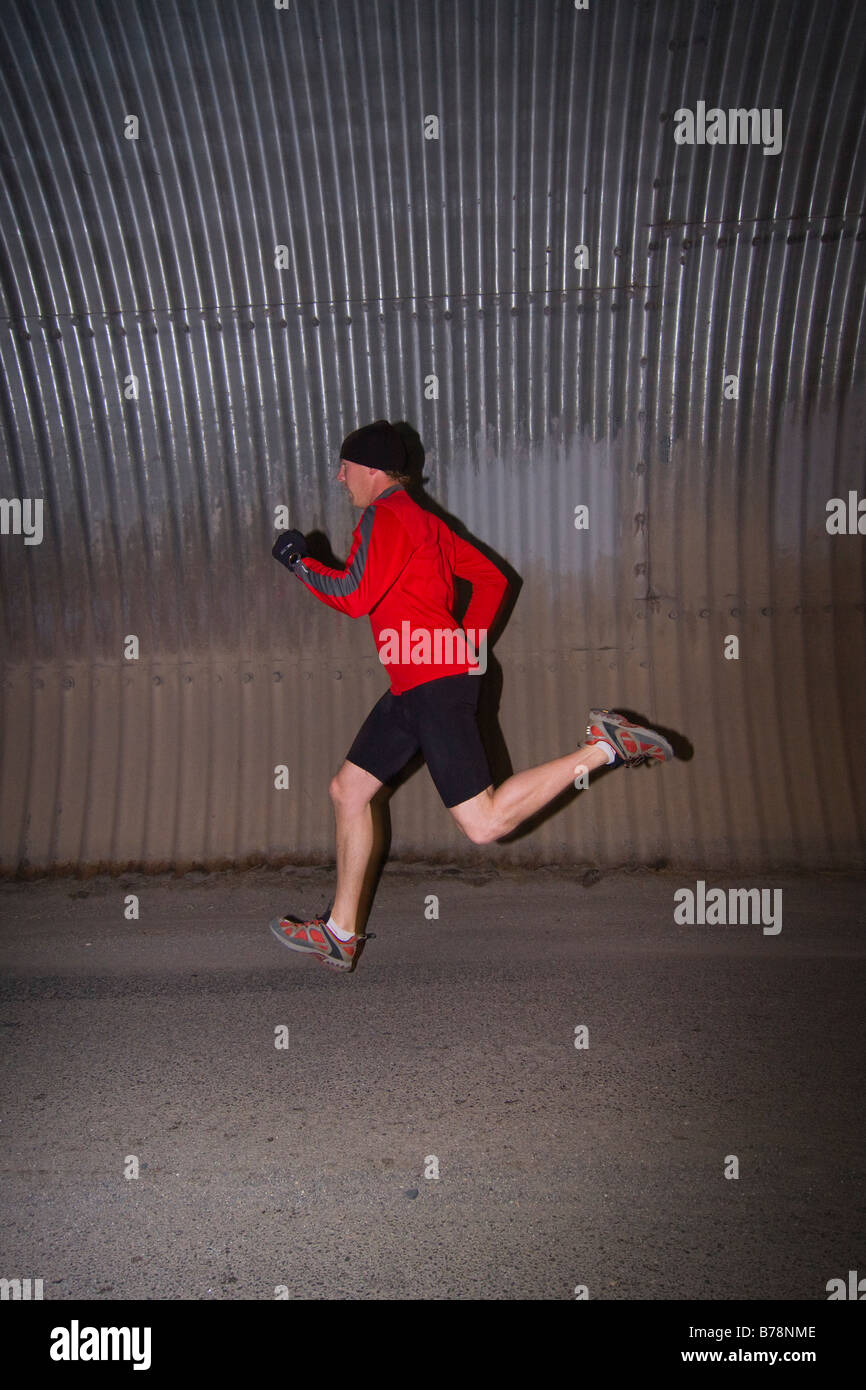 A man running through a tunnel in Reno in Nevada Stock Photo - Alamy