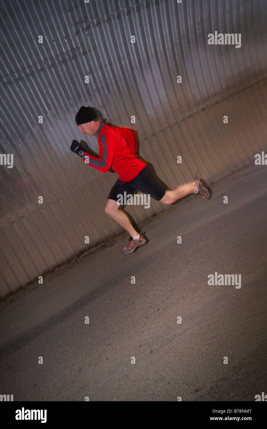 A man running through a tunnel in Reno in Nevada Stock Photo - Alamy