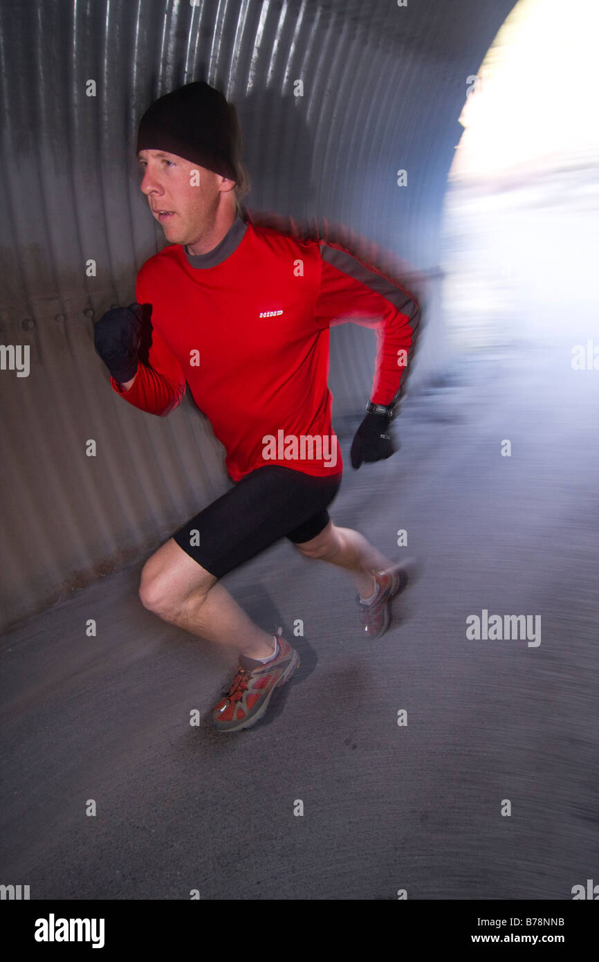 A man running through a tunnel in Reno in Nevada Stock Photo - Alamy