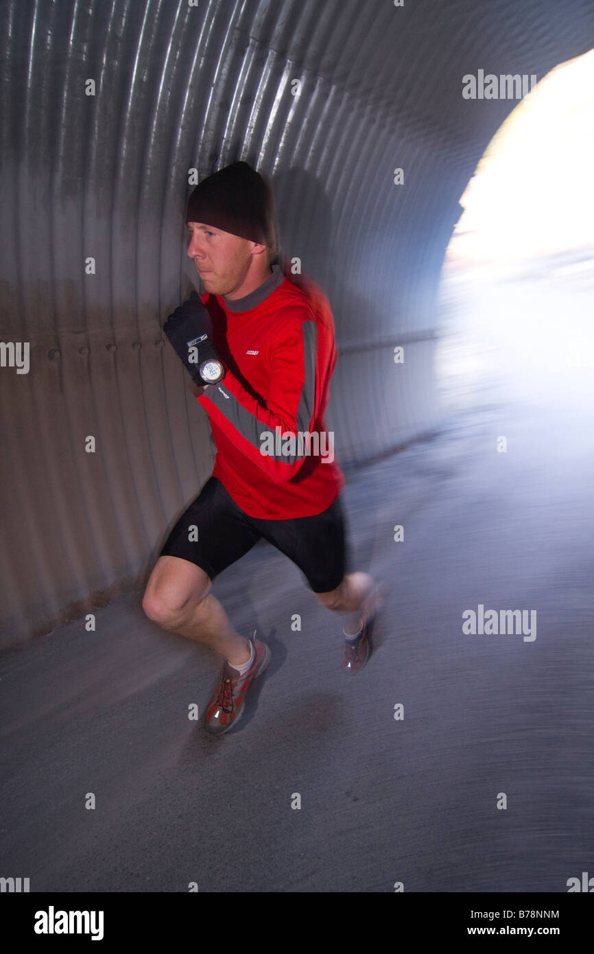 A man running through a tunnel in Reno in Nevada Stock Photo - Alamy