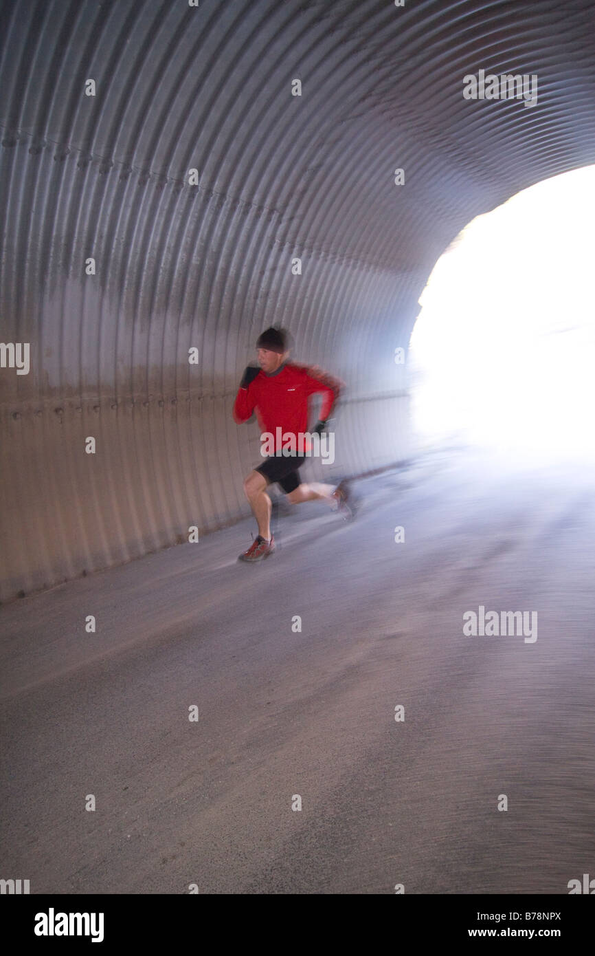 A man running through a tunnel in Reno in Nevada Stock Photo - Alamy
