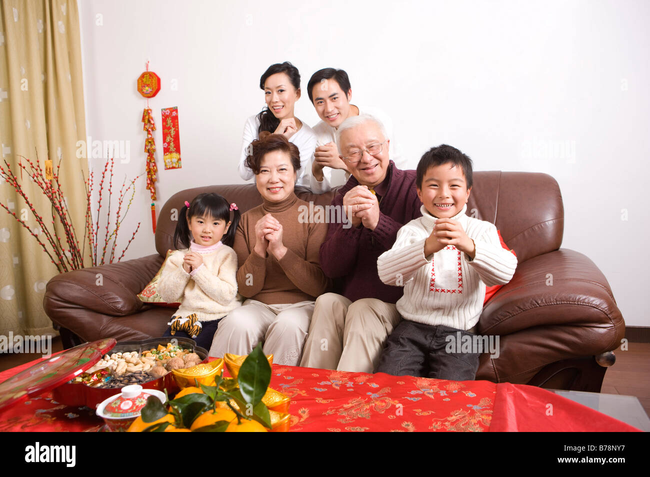 Smiling black mother braids hi-res stock photography and images - Alamy
