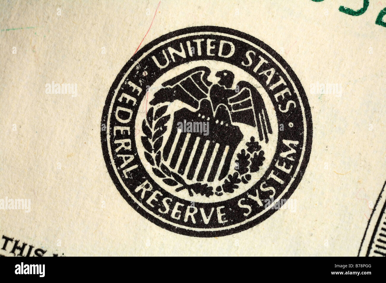 Macro of the Federal Reserve seal printed on a US banknote Stock Photo ...