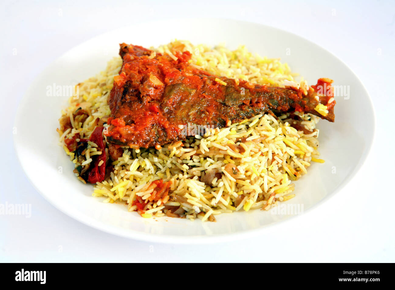 A plate of traditional Gulf Arab fish majboos (baked fish with special ...