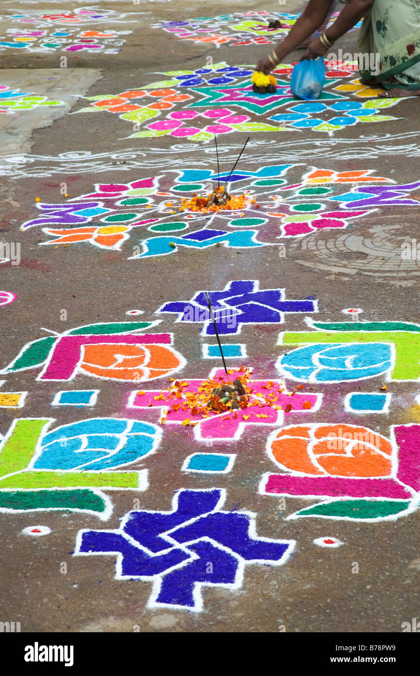 Rangoli festival designs in an Indian street made at the hindu festival ...
