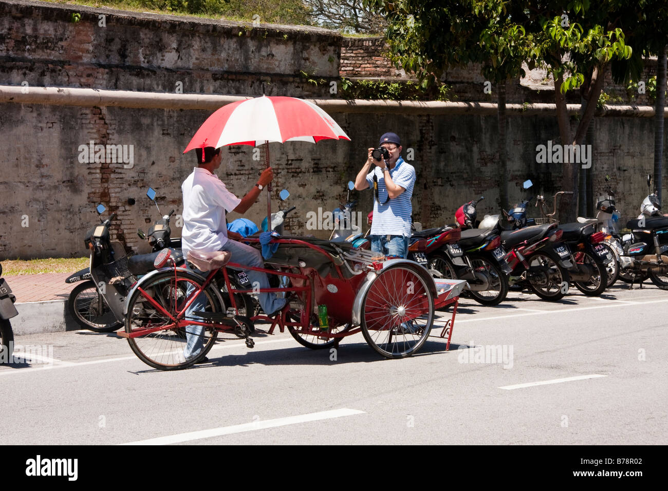 Trishaw rider hi-res stock photography and images - Alamy
