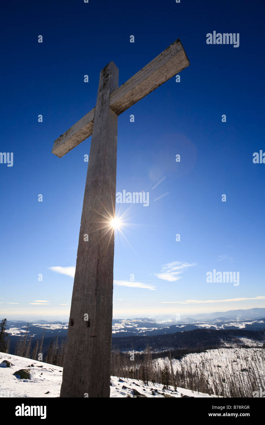 Germany, Bavarian Forest, Cross in winter landscape Stock Photo - Alamy