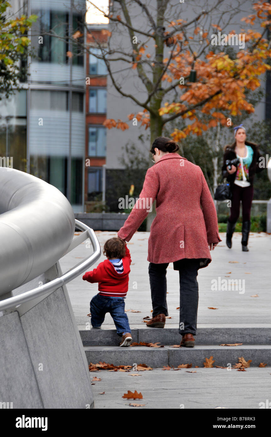 Mother and child rear view Stock Photo - Alamy