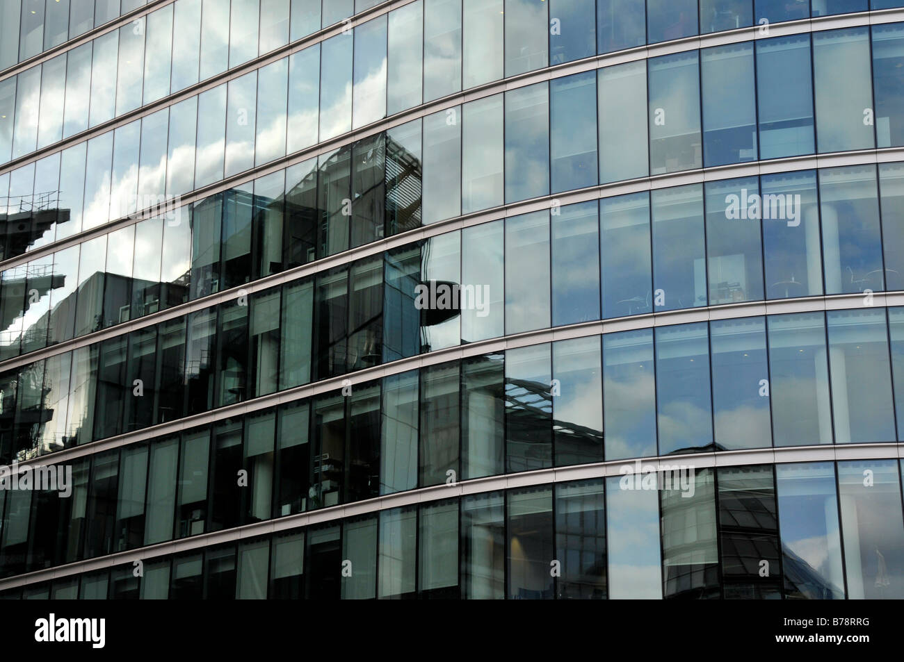 Reflection on window glass of building Stock Photo - Alamy