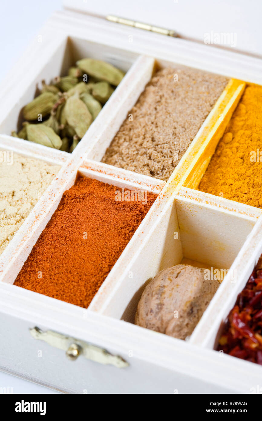 Variety of spices in wooden box, elevated view, close-up Stock Photo ...