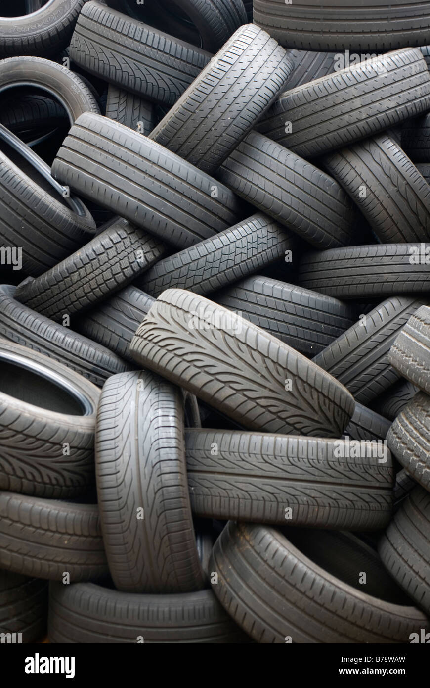 Pile of used tires for recycling, full frame, close-up Stock Photo - Alamy
