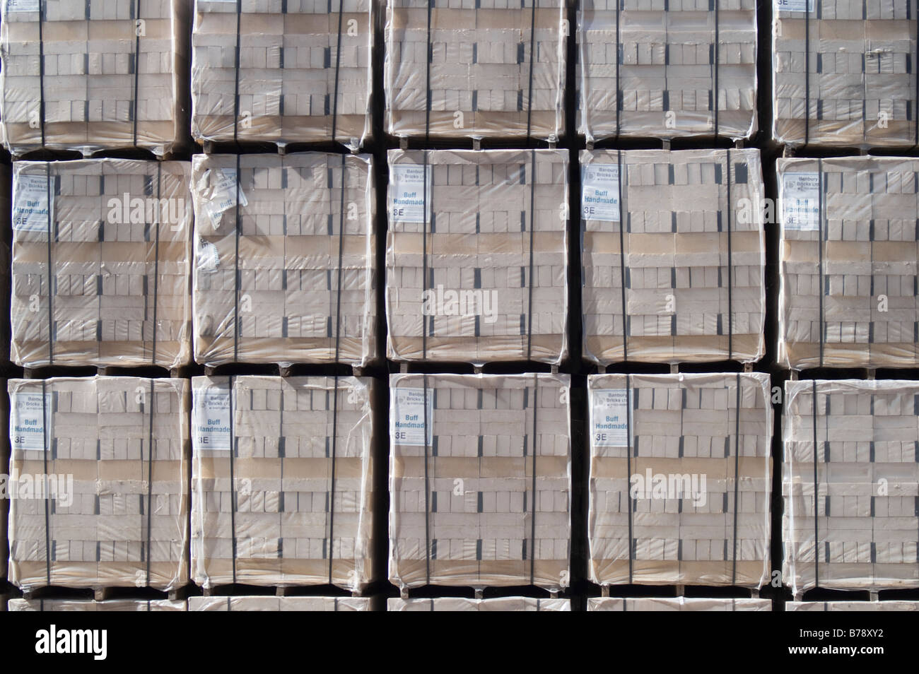 Stacked crates of bricks Stock Photo - Alamy