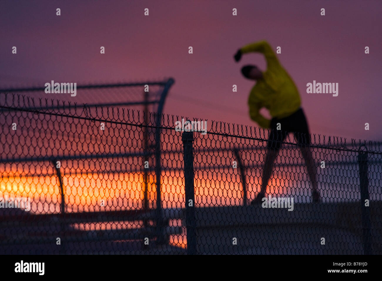 Man running into sunset hi-res stock photography and images - Alamy