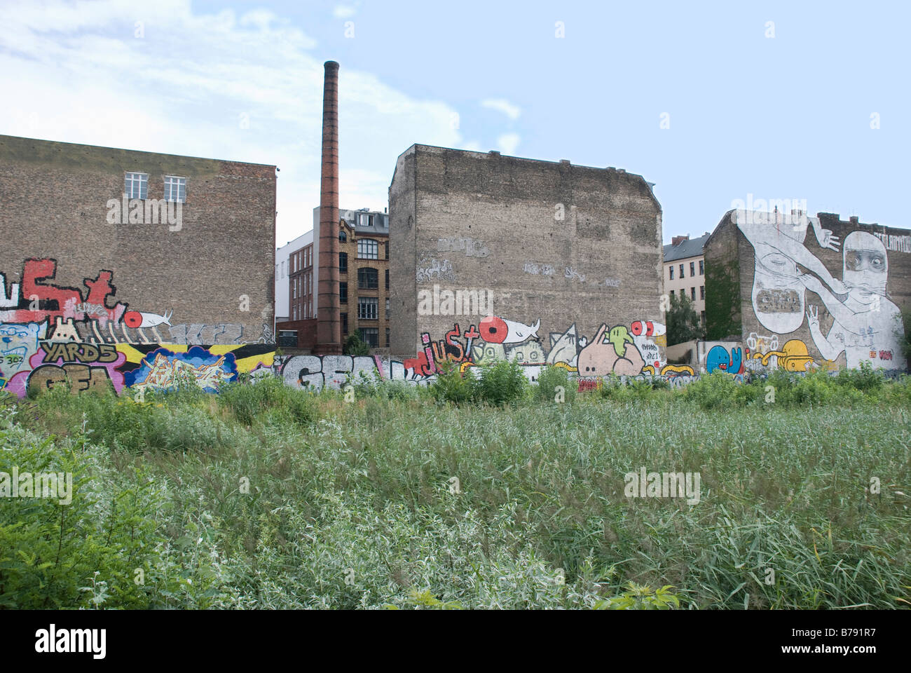 Germany, Berlin, Old factory building with graffiti Stock Photo - Alamy