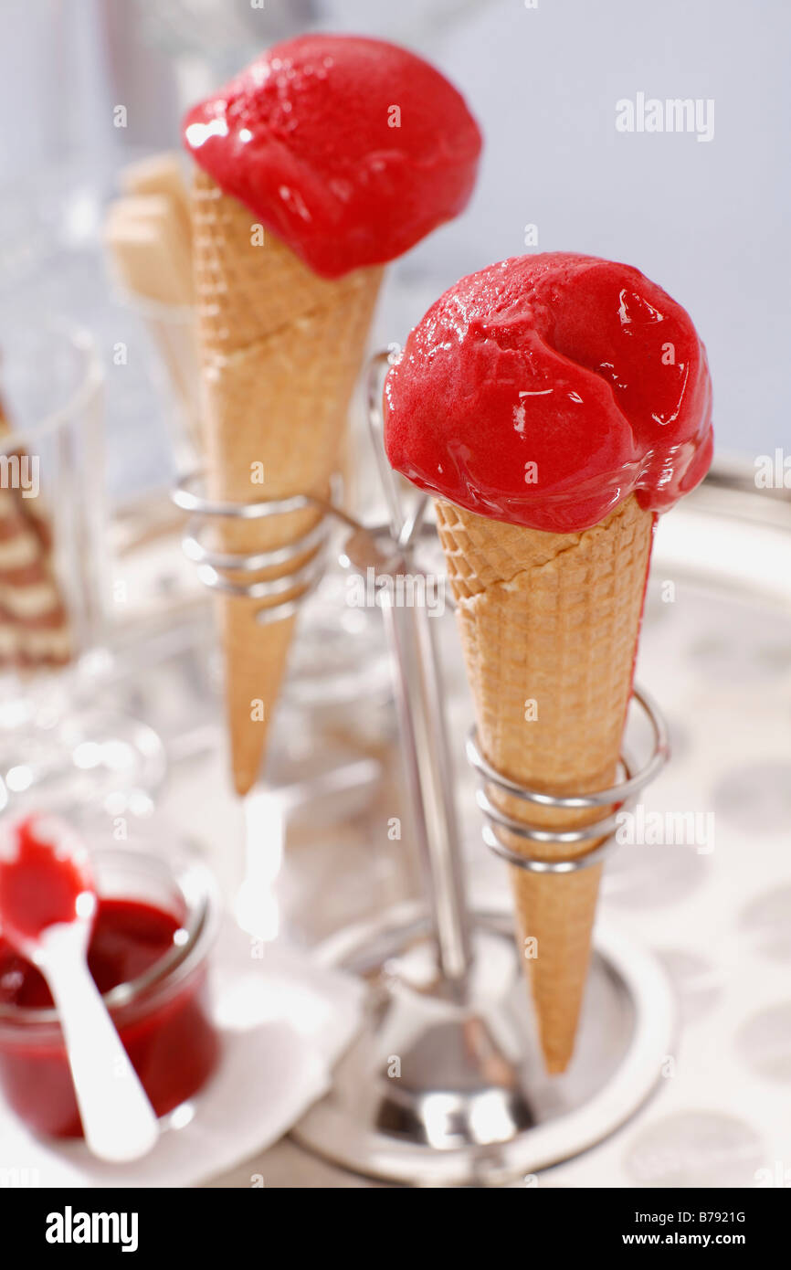 Raspberry ice cream in ice cream cones Stock Photo - Alamy