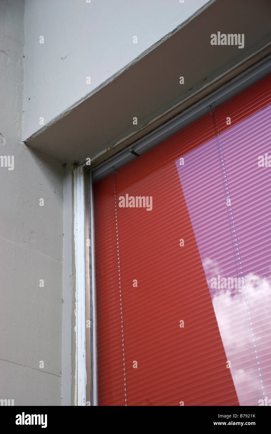 Window with closed blind, reflection of sky and clouds Stock Photo - Alamy