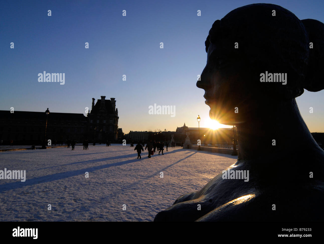 Winter scenery in the Jardin des Tuileries, with statues covered by ...