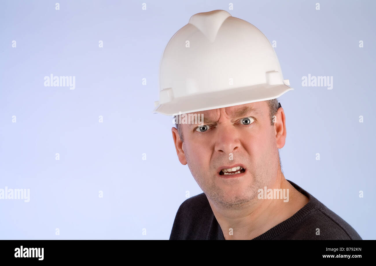 A construction worker is mad about something Stock Photo - Alamy