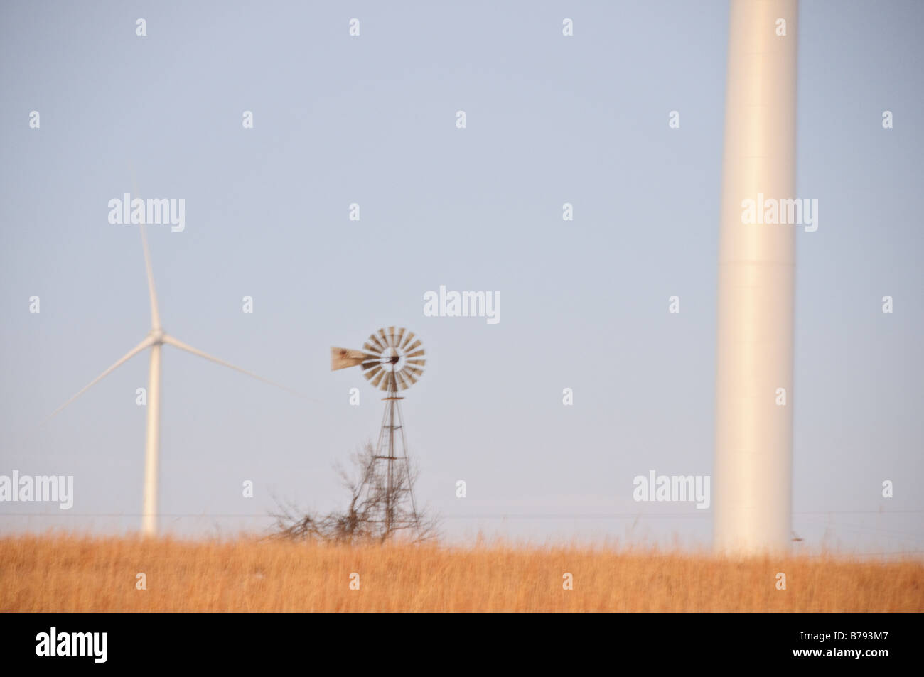 Modern wind turbine and old windmill hi-res stock photography and ...
