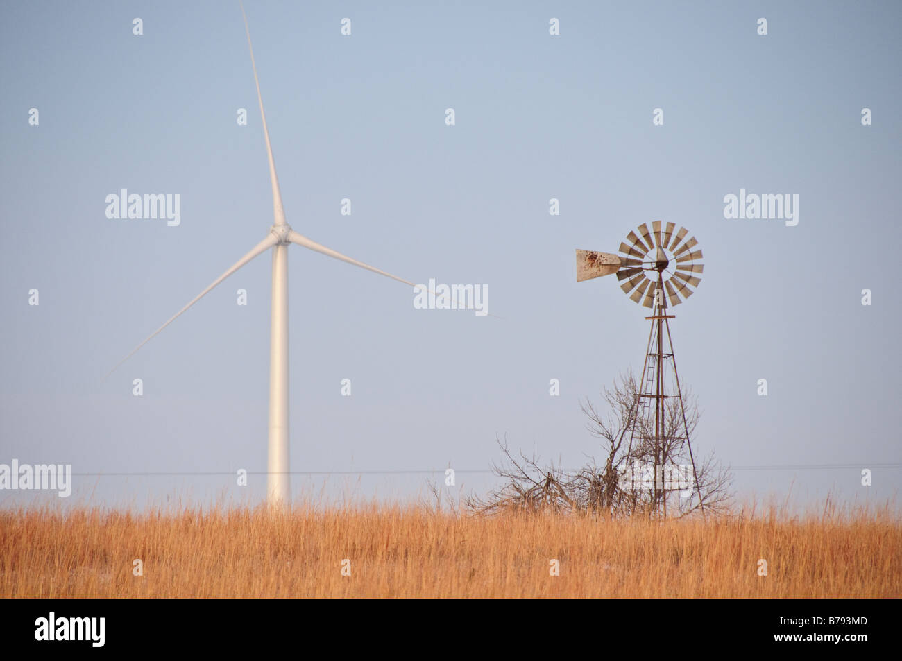 Modern wind turbine and old windmill hi-res stock photography and ...