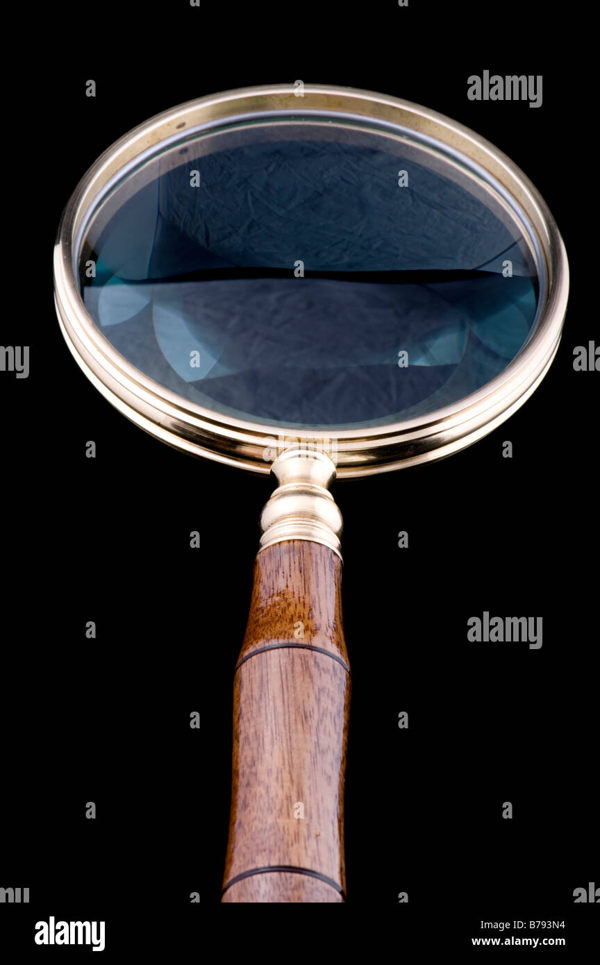 object on black tool magnifying glass Stock Photo - Alamy