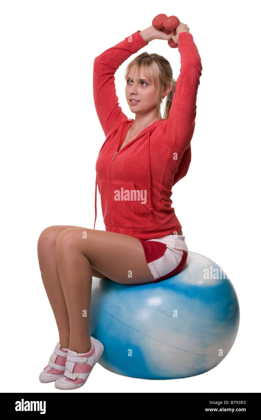 Woman red exercise ball Cut Out Stock Images & Pictures - Alamy