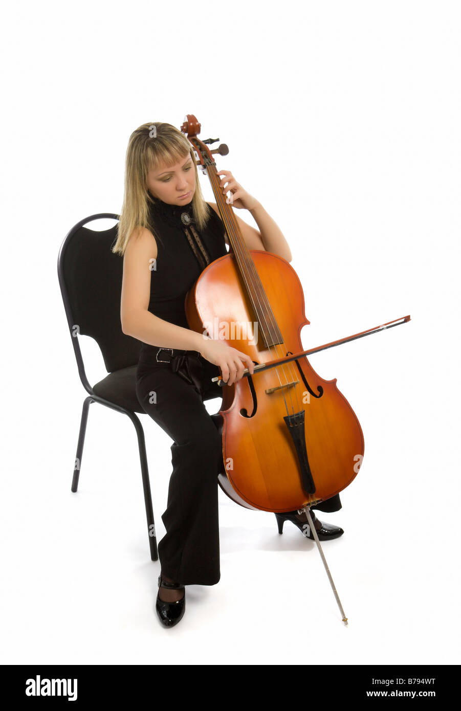 Woman musician with cello isolated on white Stock Photo - Alamy