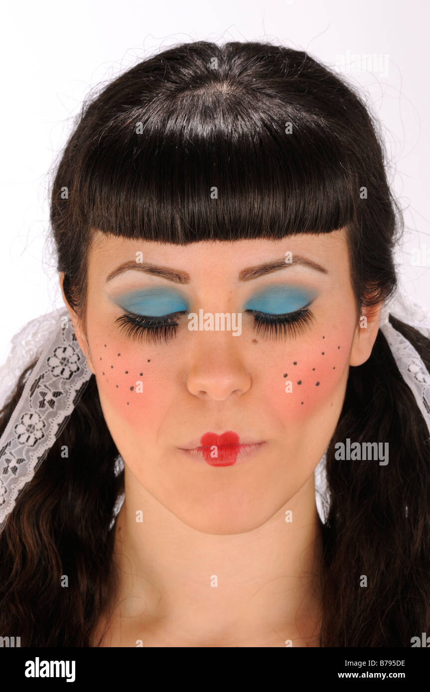 Portrait of woman made up as a fake doll Stock Photo - Alamy