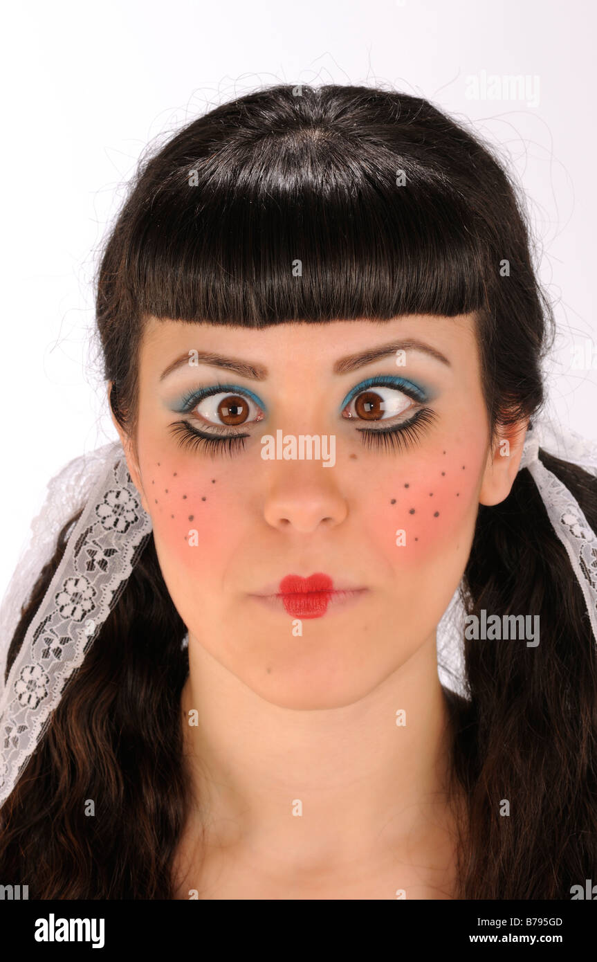 Portrait of woman made up as a fake doll Stock Photo - Alamy
