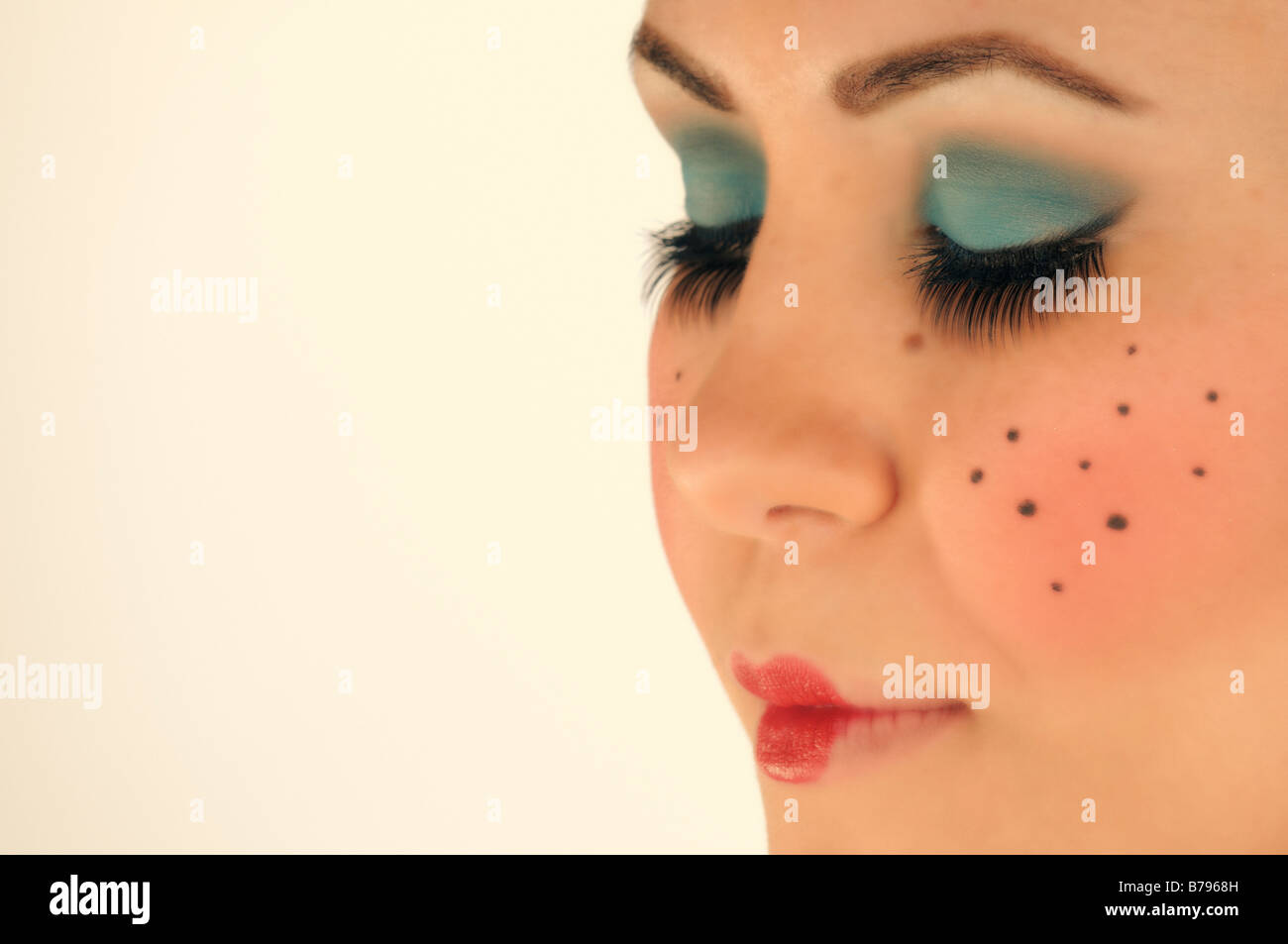 Portrait of woman made up as a fake doll Stock Photo - Alamy