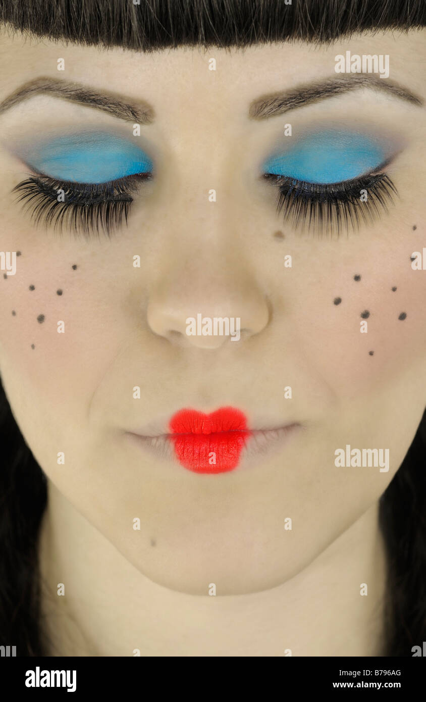 Portrait of woman made up as a fake doll Stock Photo - Alamy