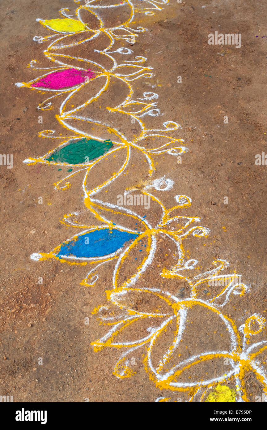 Rangoli festival designs in an Indian street made at the hindu festival ...