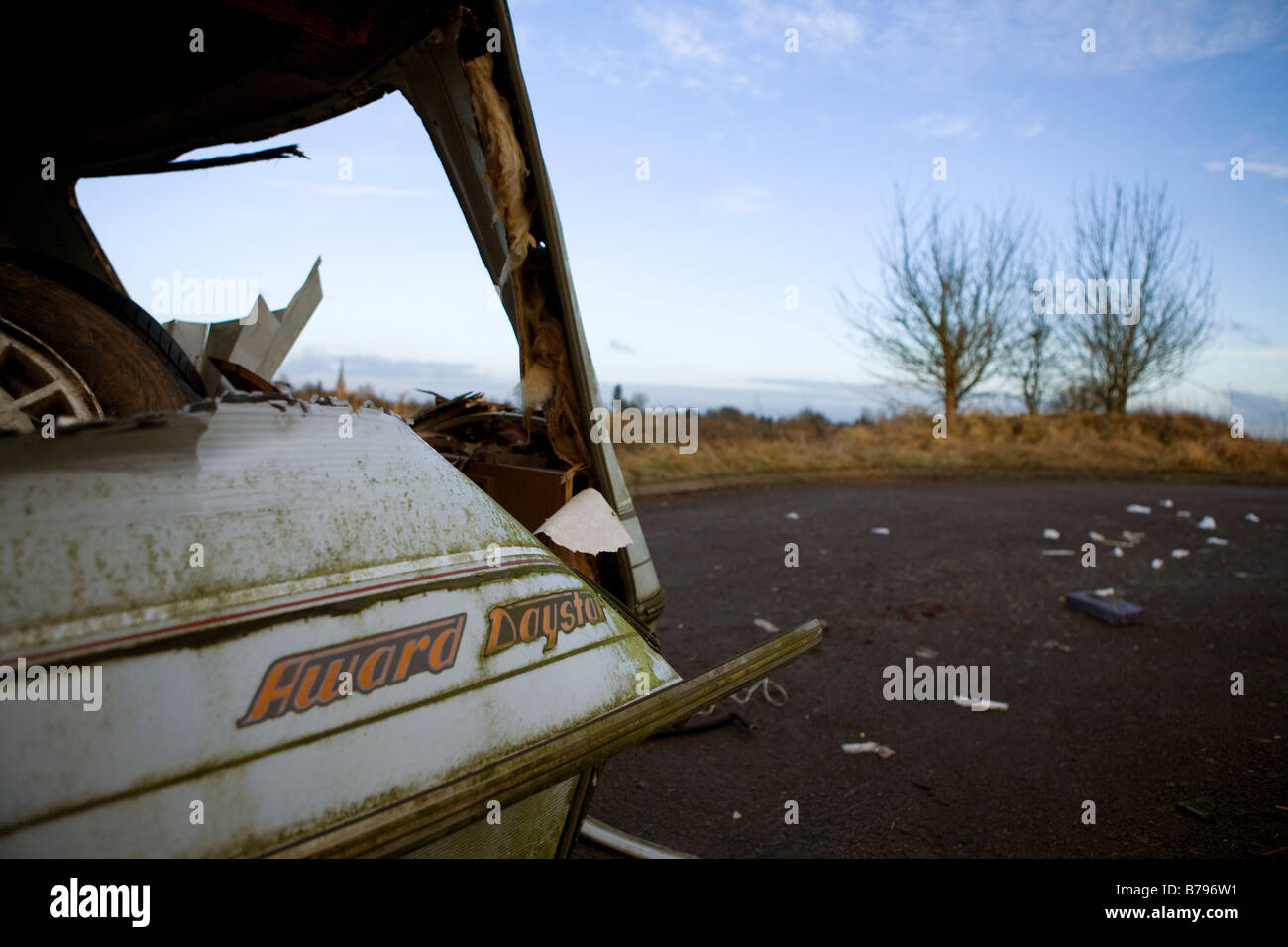 Caravan abandoned in the countryside Stock Photo - Alamy
