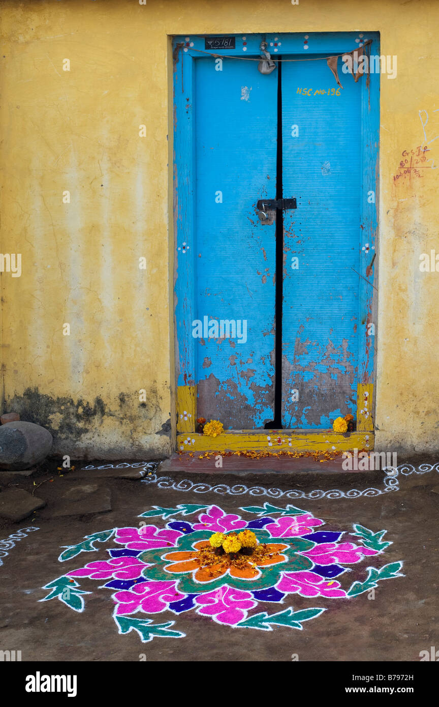 Rangoli sankranti festival design outside a rural Indian village house ...