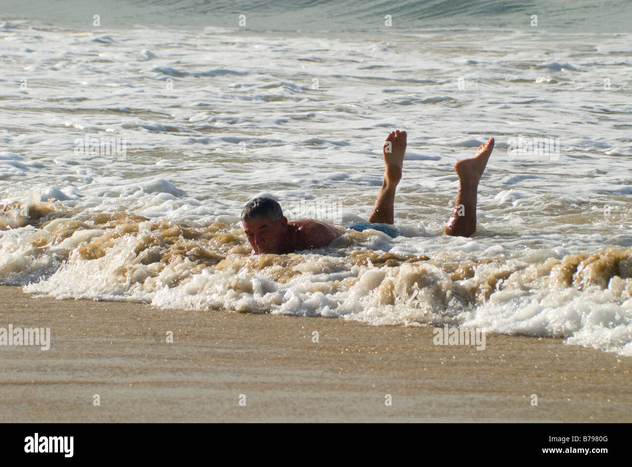 Man wave hi-res stock photography and images - Alamy