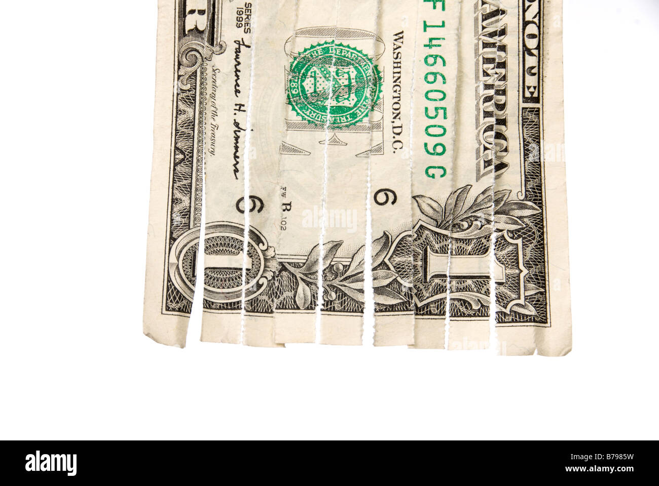 A shredded dollar bill isolated on white The image can be used for ...