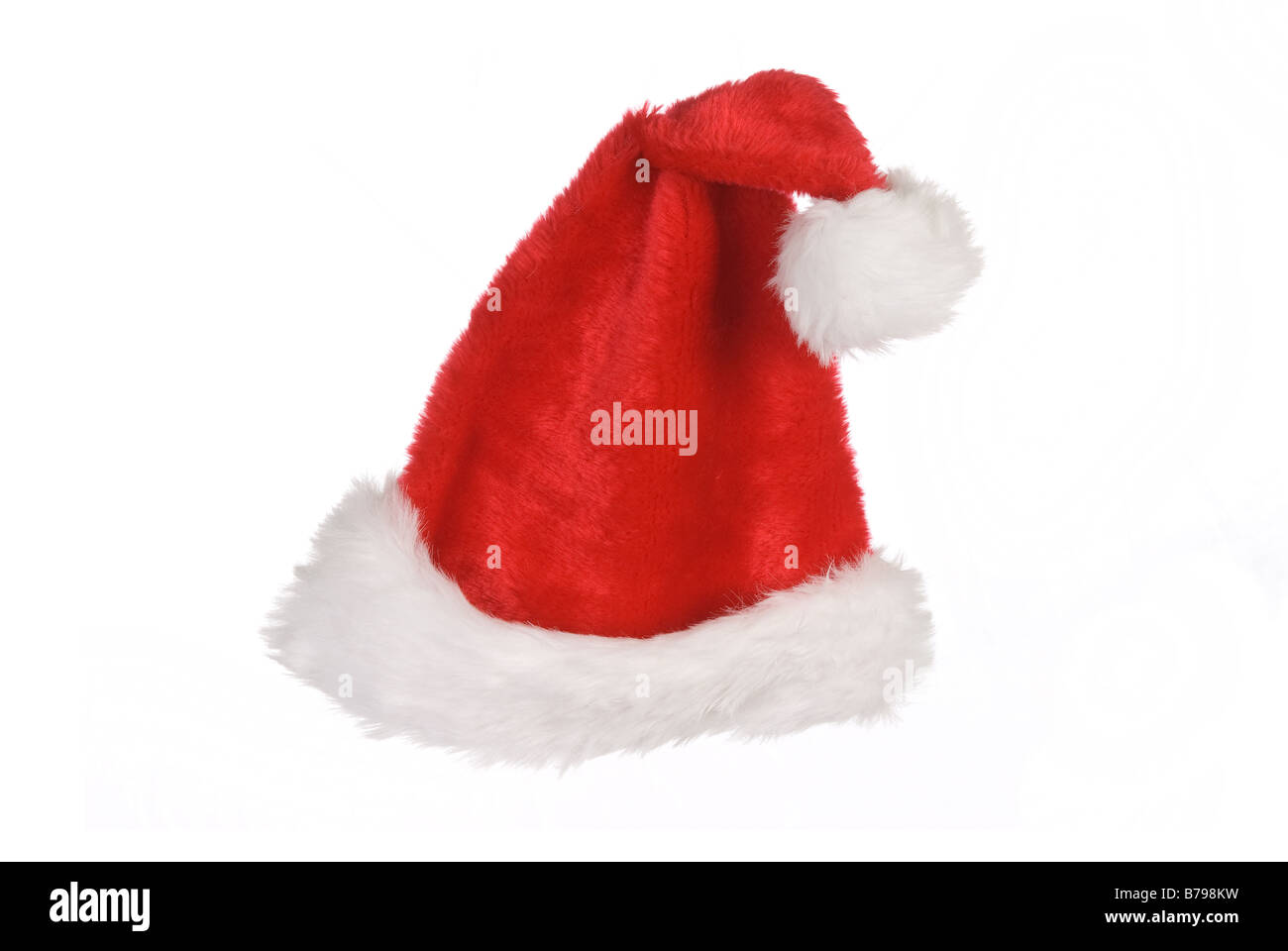 Isolated Santa hat on a white background Stock Photo - Alamy