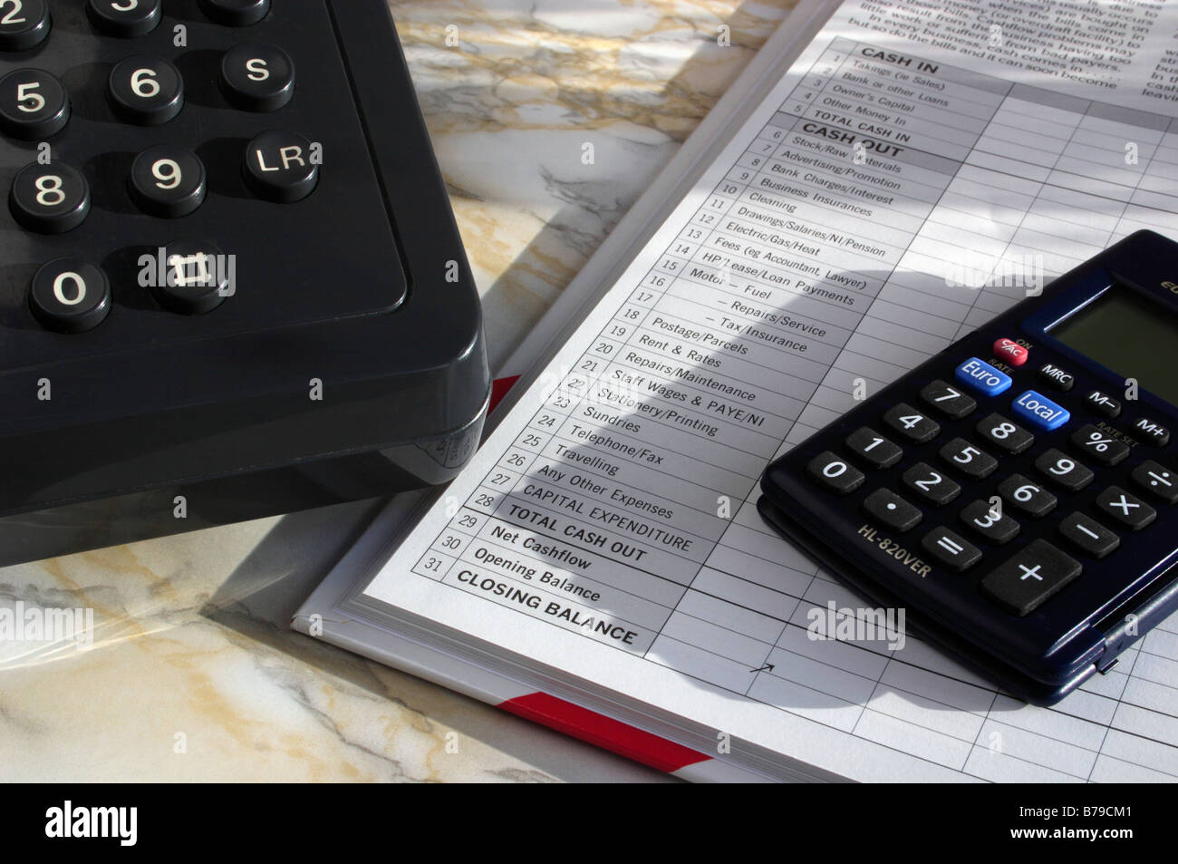 Ledger calculator hi-res stock photography and images - Alamy