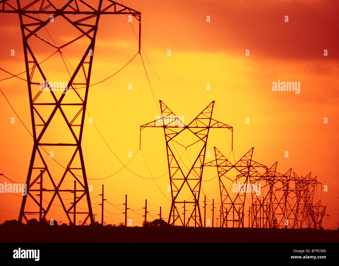 electric power lines at sunset Stock Photo - Alamy