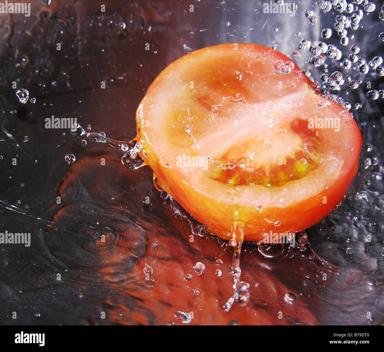 Freshly washed tomato Stock Photo - Alamy