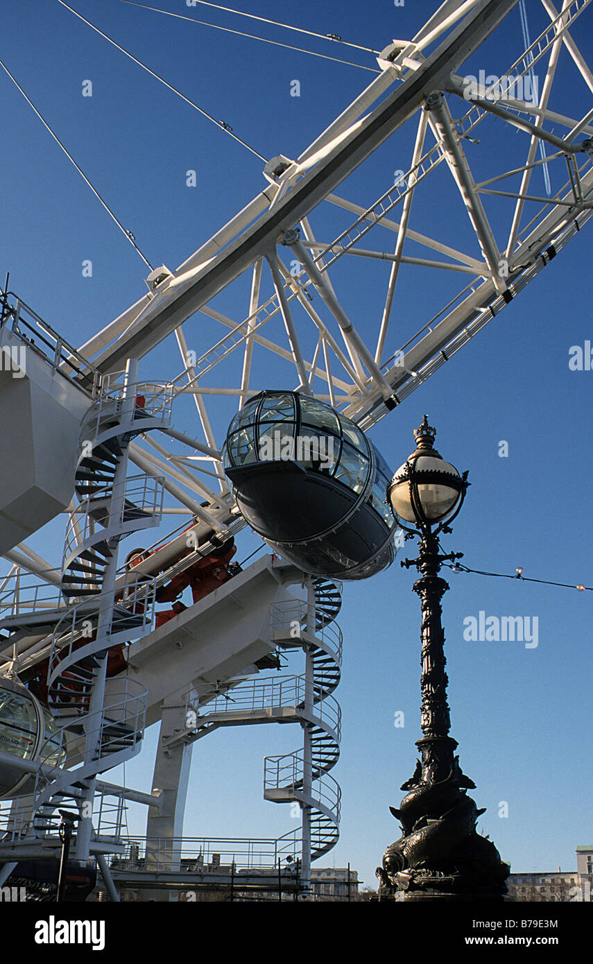 The Millennium wheel, London Eye, and Dolphin lamp standard Stock Photo ...