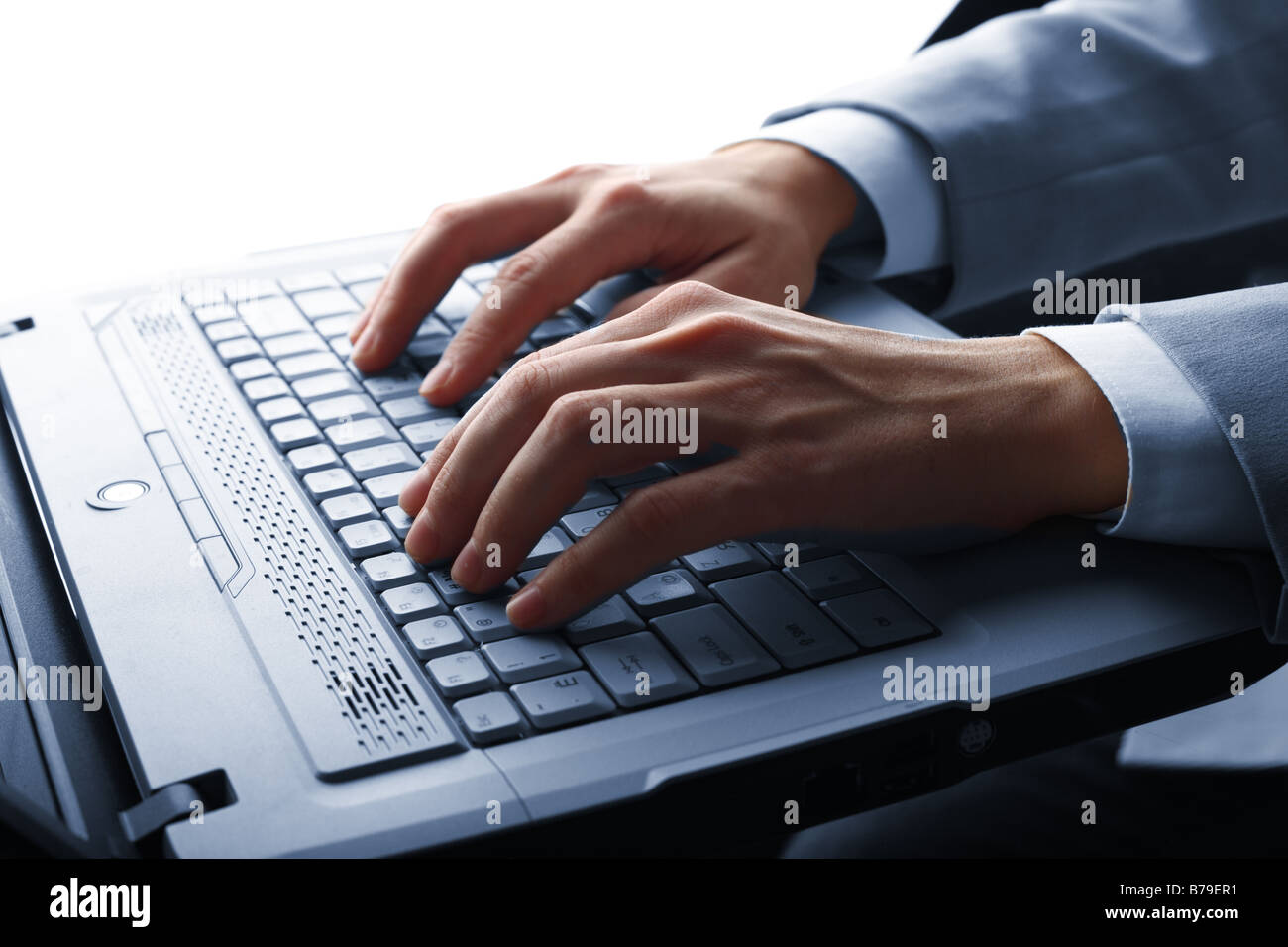 male hands typing on a laptop Stock Photo - Alamy