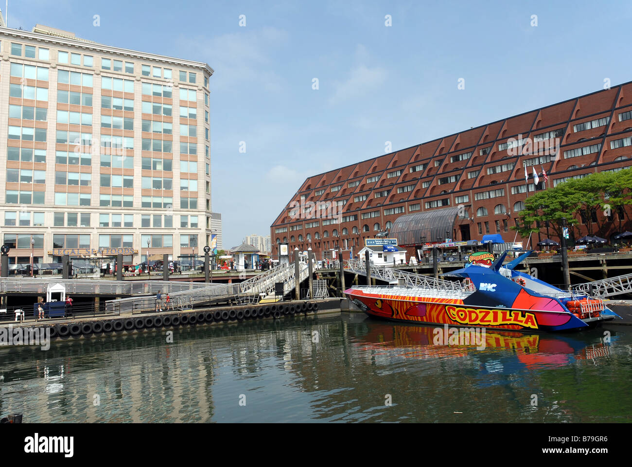 Boston harbour and tour boat Stock Photo - Alamy