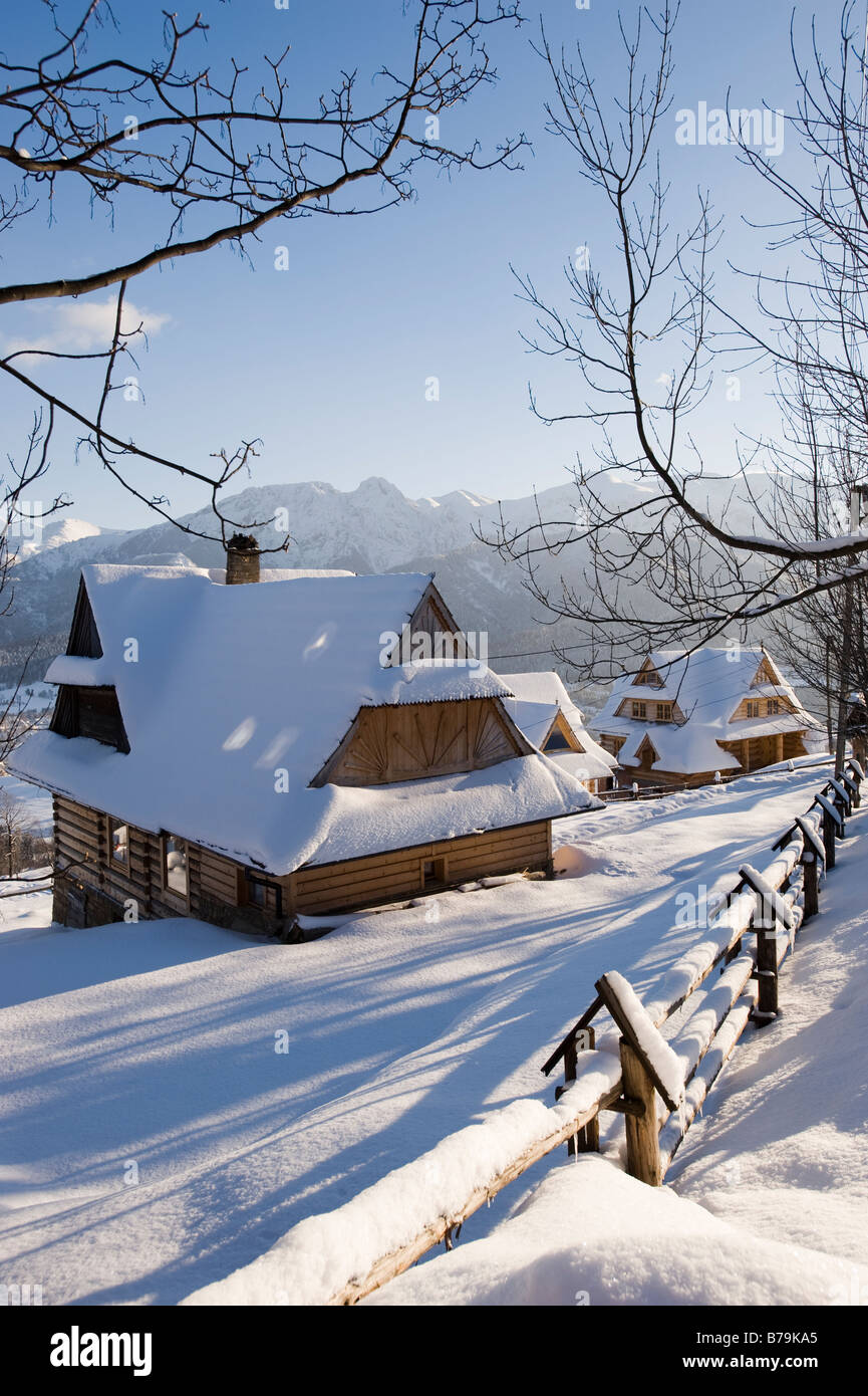 Traditional architecture of Zakopane and view of Tatra Mountains ...